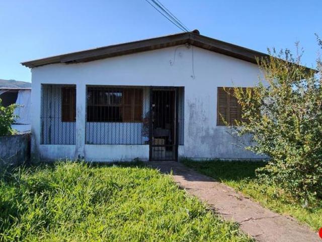 Casa com Terreno Grande com ótima Localização