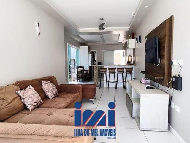Casa com terreno próximo do mar em Shangri lá