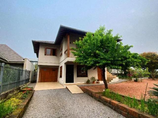 Casa com três dormitórios, sendo uma suíte. Bairro Pousada da Neve, Nova Petrópolis RS! Ref: 1559