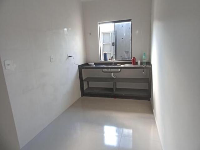 Casa com três dormitórios sendo uma suíte