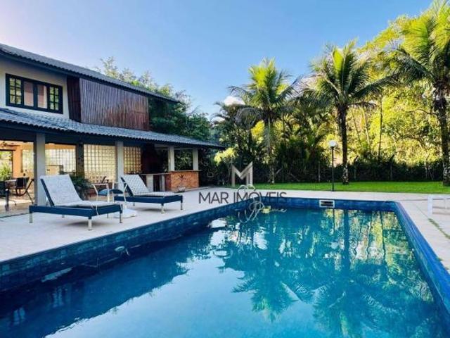 CASA COM VAGA NÁUTICA PARA ATÉ 81 PÉS NA MARINA GUARUJÁ COM PISCINA, QUADRA E 1.950M² DE TERRENO M