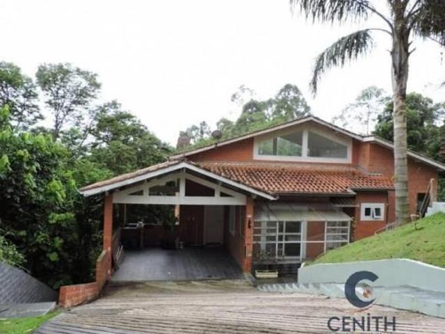Casa com vista deslumbrante e integração à natureza no Parque das Artes!
