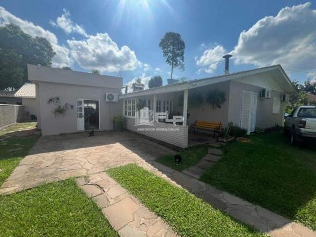 CASA COM AMPLA ÁREA DE LAZER NA CIDADE DE FELIZ