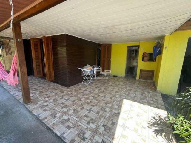 CASA COM AMPLO TERRENO EM SANTA TERESINHA