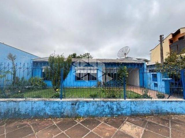 CASA COM AMPLO PÁTIO NO ARROIO GRANDE