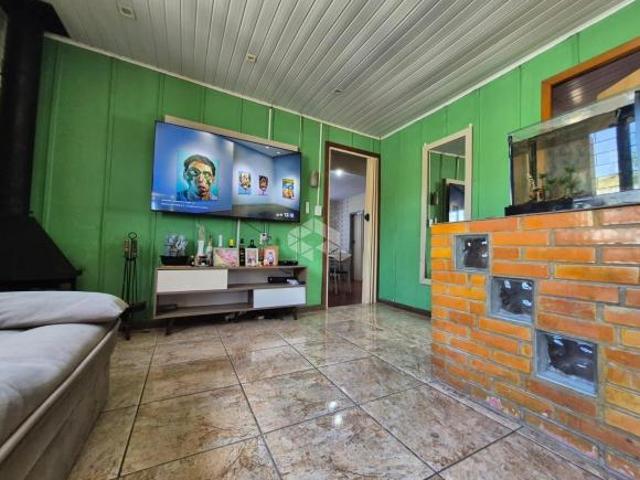 Casa com anexo, terreno 363m², sendo 11m x 33m