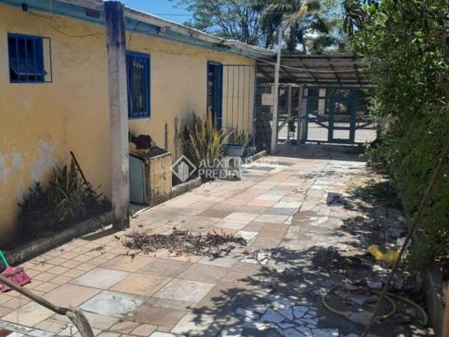 Casa com apartamento na praia de Xangri Lá ideal para morar ou investir