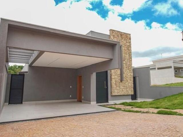 Casa com arquitetura moderna no Cond San Tiago | Só aqui na Imobiliária Rosa e Rangel