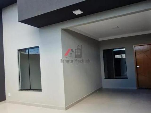 Casa com arquitetura moderna no Santa Alice II e sala com pé direito alto