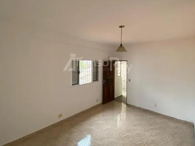 Casa com edícula