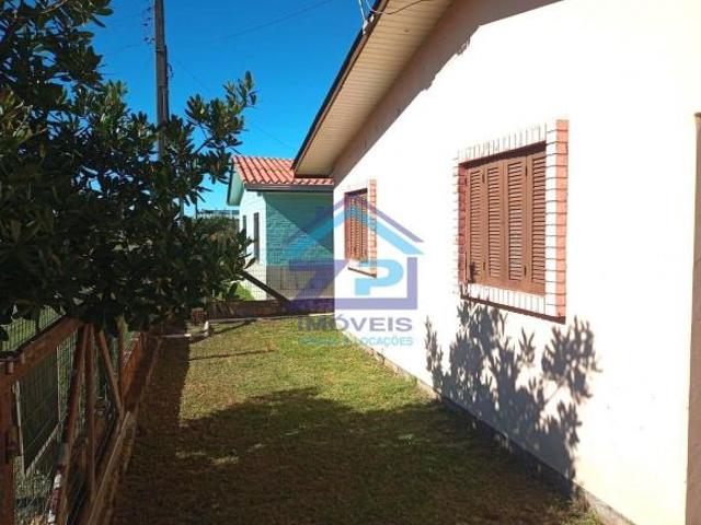 CASA COM EDÍCULA SÃO JORGE