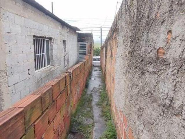 Casa com edícula