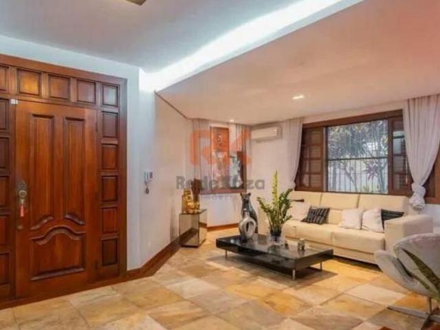 Casa com habite se à venda no bairro São Luiz | 462m² | 1.000m² | 5 quartos | 2 suítes | Piscina com