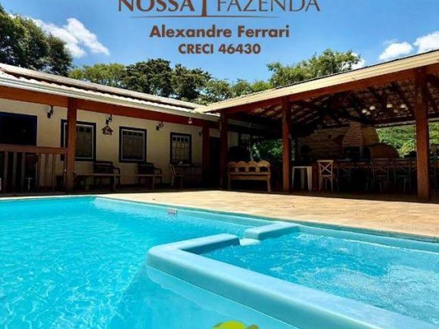 Casa com lagoa à venda no Condomínio Nossa Fazenda em Esmeraldas MG