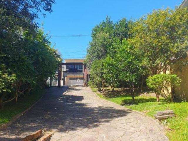 Casa com Lareira e Pé direito duplo em Nossa Senhora de Lourdes, Ca