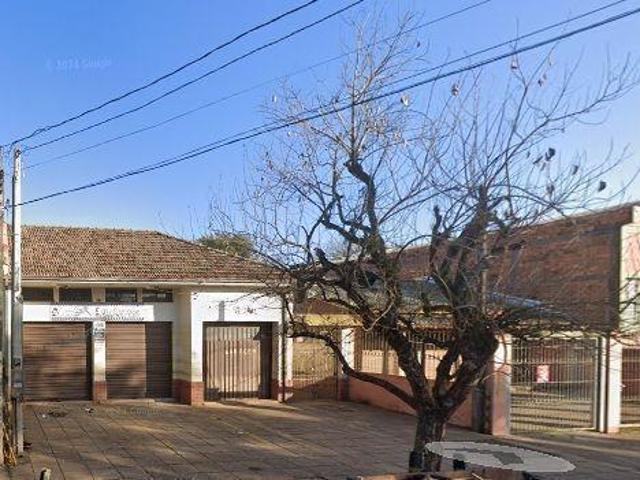 Casa com loja na frente a venda no Bairro Anchieta