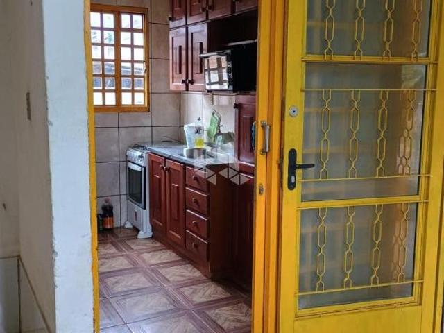 Casa com pátio, 2 dormitórios, Suíte e 2 banheiros