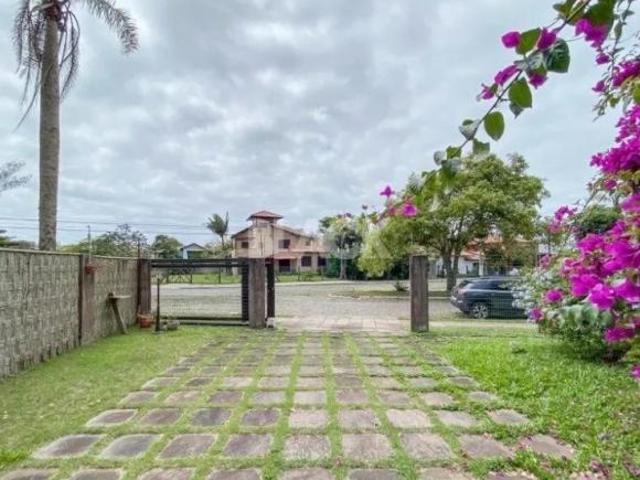 Casa com piscina na Praia Grande Torres RS