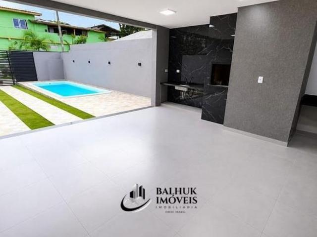Casa com piscina na praia