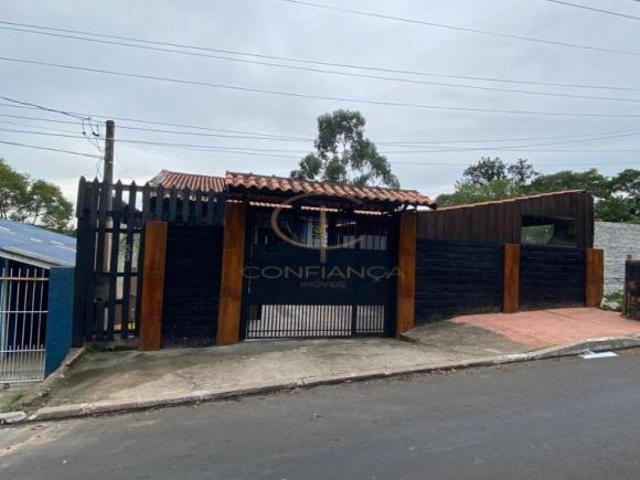 Casa com piscina no Olaria