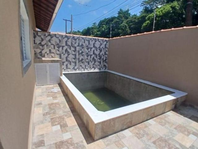 CASA COM PISCINA NO BAIRRO GUACYRA COM 2 QUARTOS EM ITANHAÉM