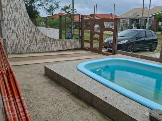 CASA COM PISCINA NO CENTRO DE CIDREIRA