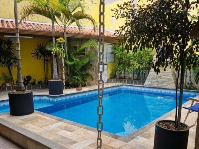 Casa com piscina à venda, 109 m² por R$ 1.490.000 Caiçara Praia Grande/SP