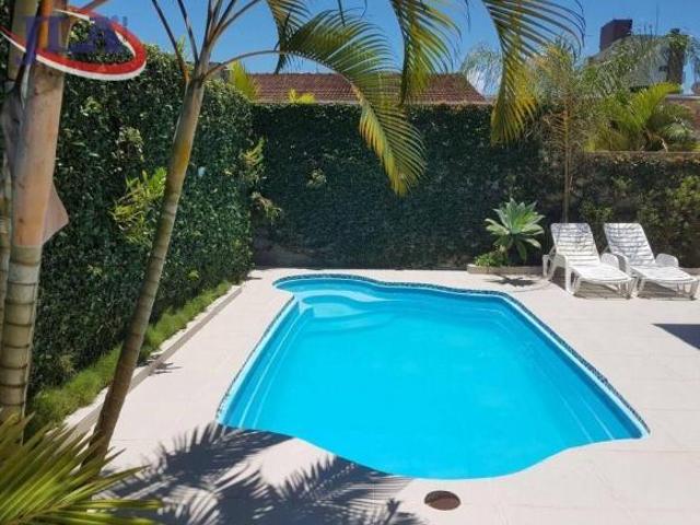 Casa com piscina à venda, 130 m² por R$ 1.250.000 Centro Guaratuba/PR