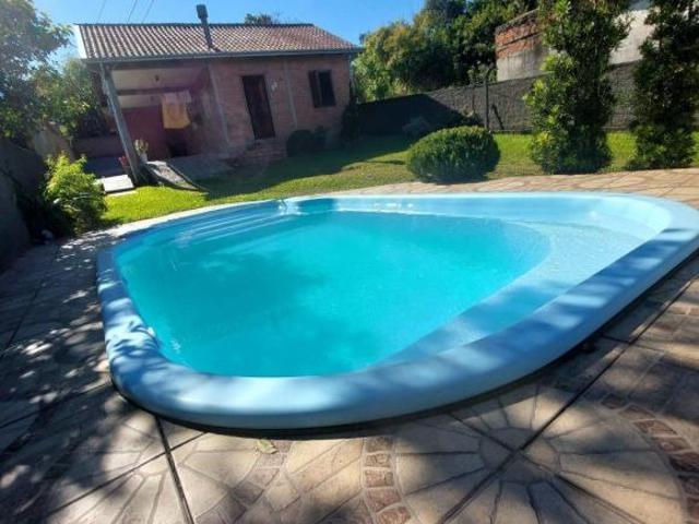 Casa com Piscina à Venda em Santo Onofre, Viamão
