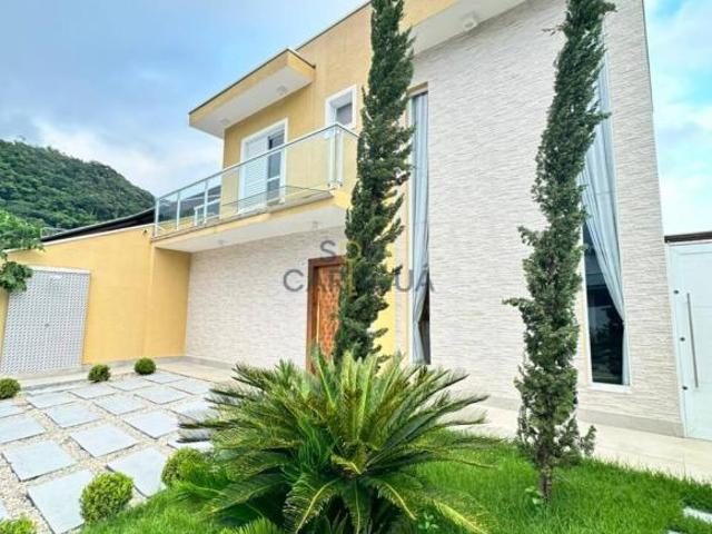 Casa com piscina a venda no Condomínio Portal Patrimonium em Caraguatatuba