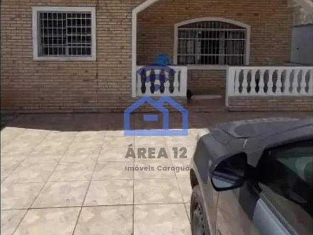 Casa com piscina à venda no bairro do Perequê Mirim em Caraguatatuba, SP