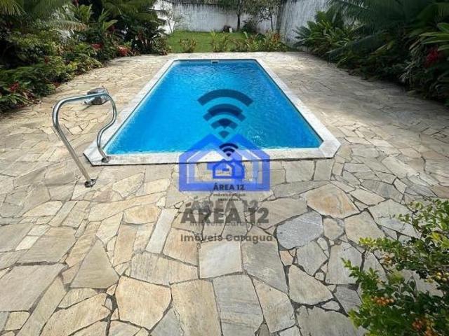 Casa com piscina à venda na Martim de Sá, 3 dormitórios, sendo 1 suíte, sala com dois ambientes, coz