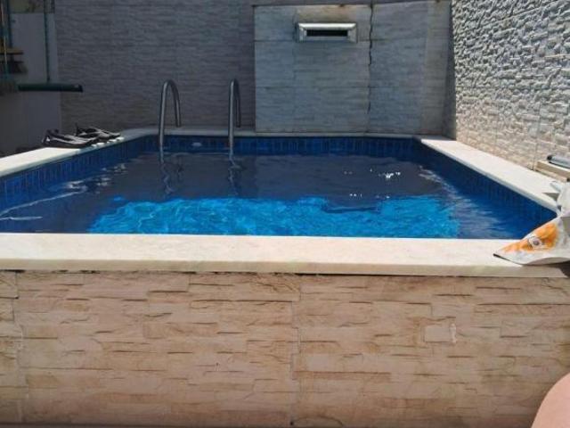 CASA COM PISCINA A VENDA NA PRAIA EM ITANHAÉM