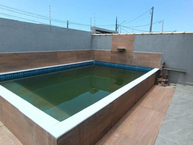 CASA COM PISCINA A VENDA NA PRAIA EM ITANHAÉM
