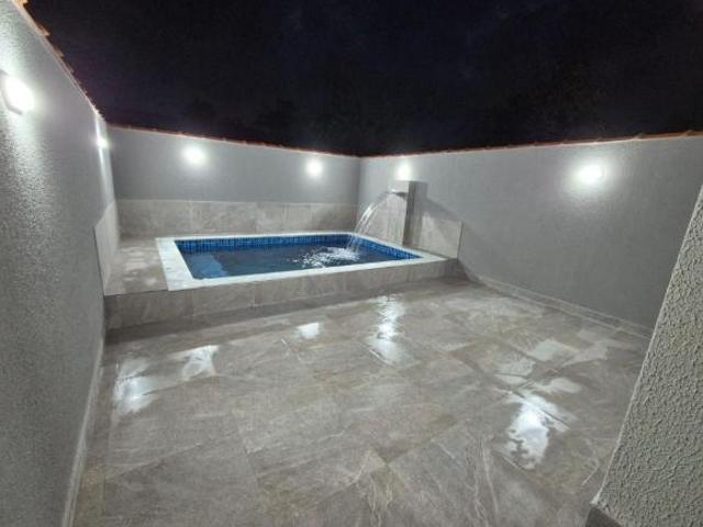 CASA COM PISCINA A VENDA NA PRAIA EM ITANHAÉM
