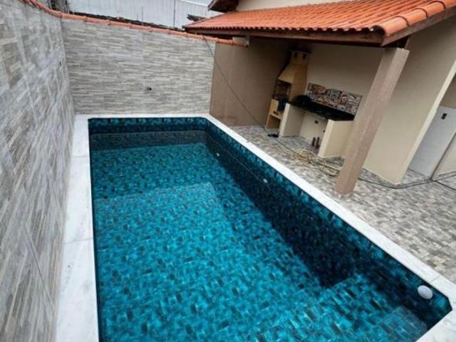 CASA COM PISCINA A VENDA NA PRAIA EM ITANHAÉM