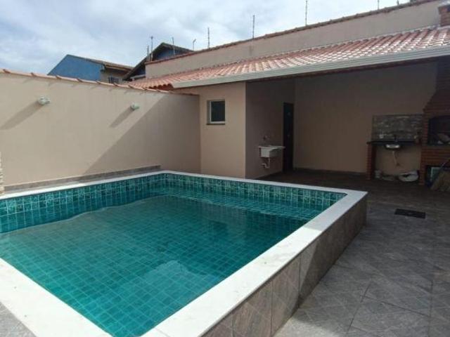 CASA COM PISCINA A VENDA NA PRAIA EM ITANHAÉM