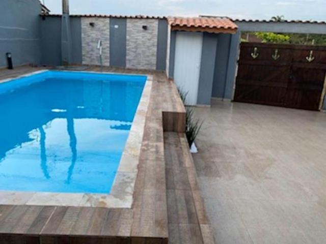 CASA COM PISCINA A VENDA NA PRAIA EM ITANHAÉM/SP