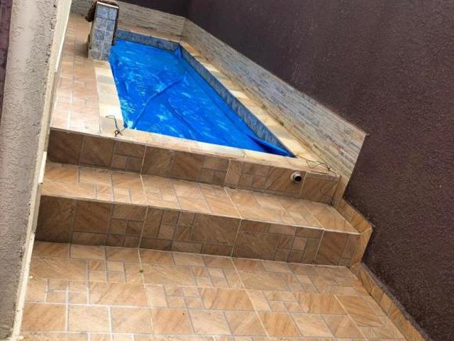 CASA COM PISCINA A VENDA NA PRAIA EM ITANHAÉM/SP