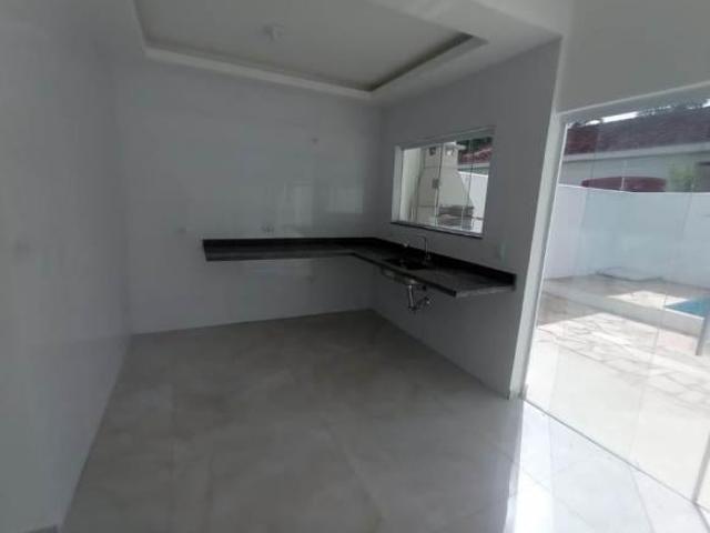 CASA COM PISCINA A VENDA NA PRAIA EM ITANHAÉM/SP