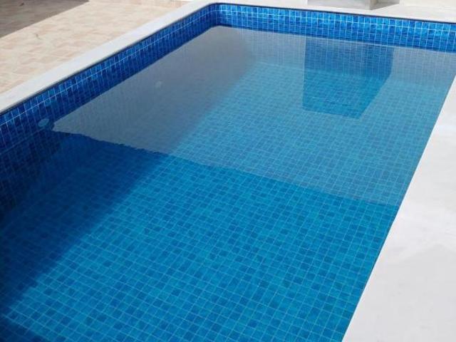 CASA COM PISCINA A VENDA NA PRAIA EM ITANHAÉM/SP