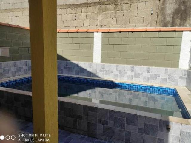 CASA COM PISCINA A VENDA NA PRAIA EM ITANHAÉM/SP
