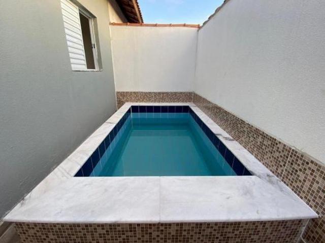 CASA COM PISCINA A VENDA NA PRAIA EM ITANHAÉM/SP
