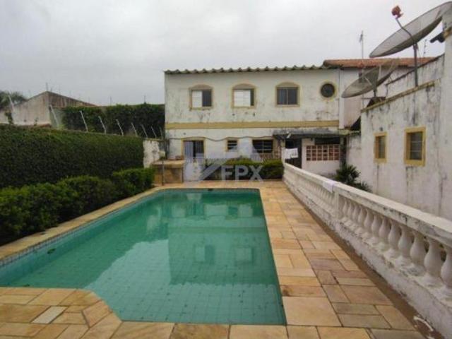 CASA COM PISCINA A VENDA NA PRAIA EM ITANHAÉM/SP