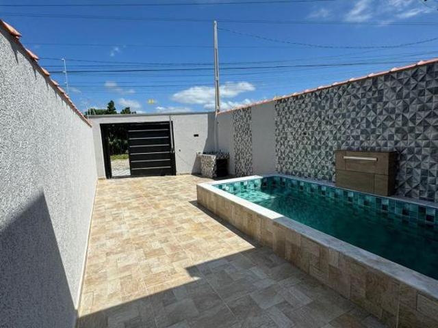 CASA COM PISCINA A VENDA NA PRAIA EM ITANHAÉM/SP