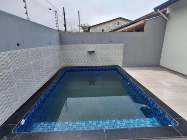 CASA COM PISCINA A VENDA NA PRAIA EM ITANHAÉM/SP