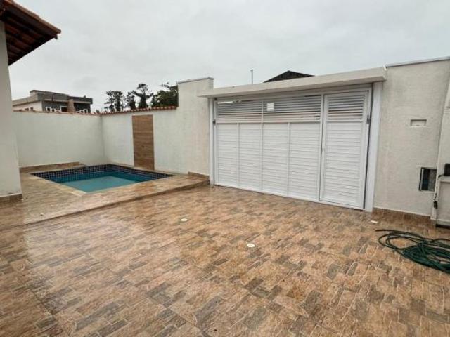CASA COM PISCINA A VENDA NA PRAIA EM ITANHAÉM/SP