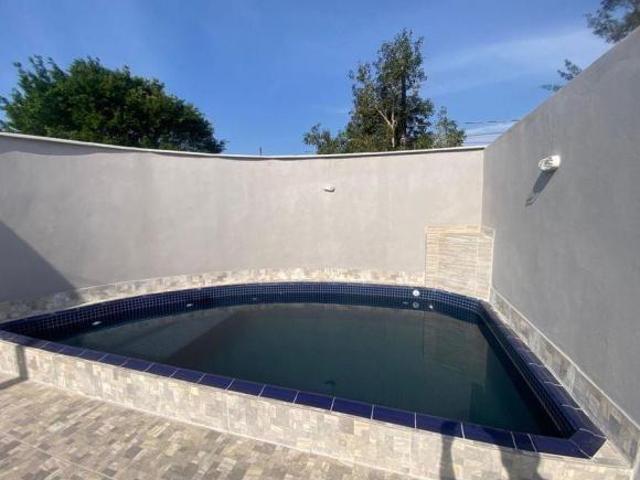 CASA COM PISCINA A VENDA NA PRAIA EM ITANHAÉM/SP