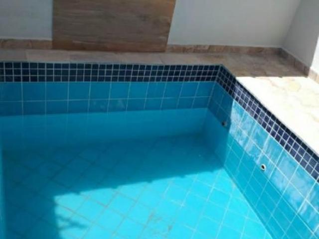 CASA COM PISCINA A VENDA NA PRAIA EM ITANHAÉM/SP