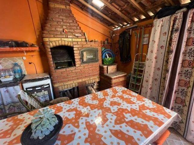 CASA COM PISCINA A VENDA NA PRAIA EM ITANHAÉM/SP